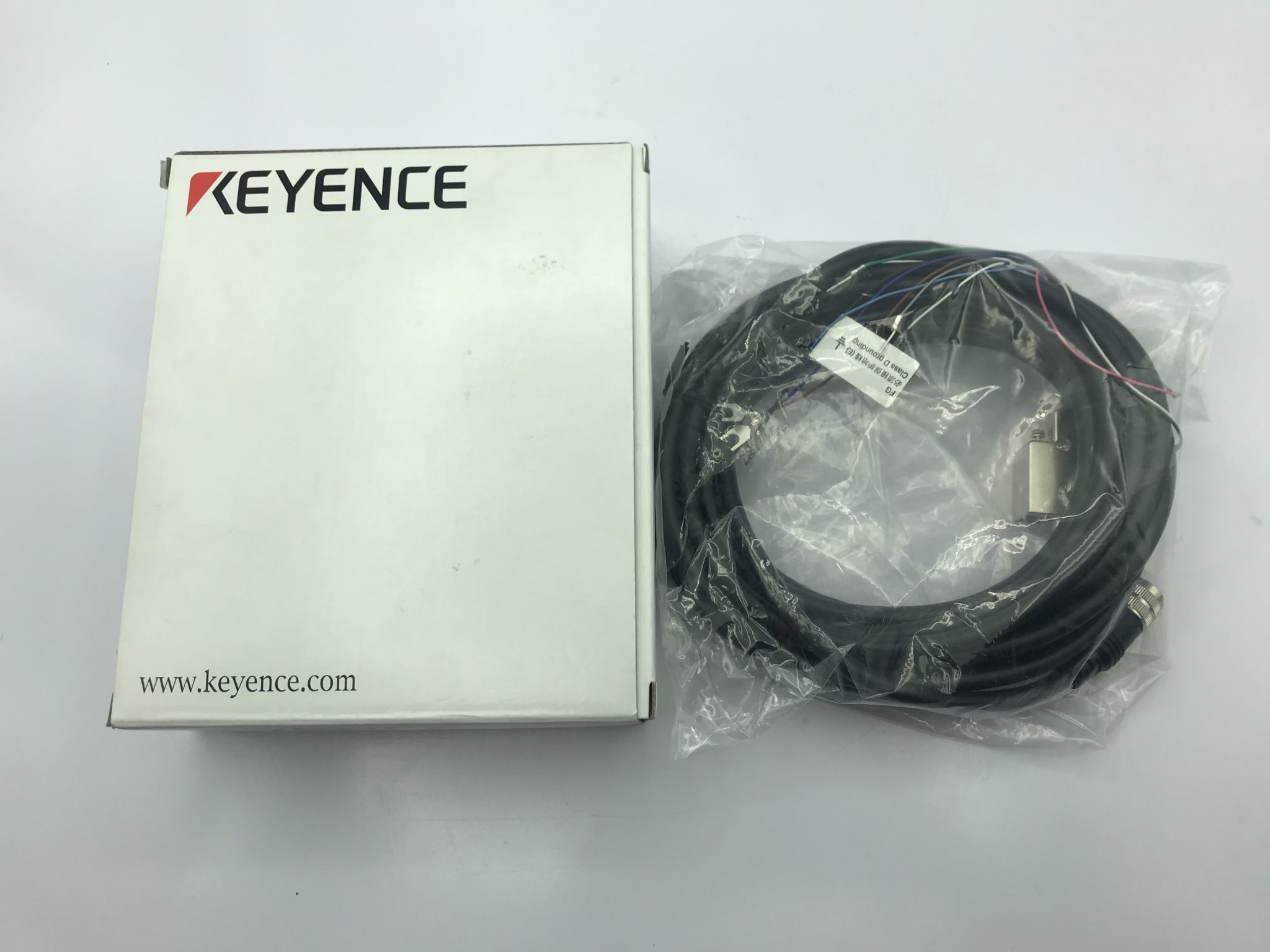 OP-87528 KEYENCE CONTROL CABLE 12PIN MALE 9PIN FEMALE – PLC COMPANY